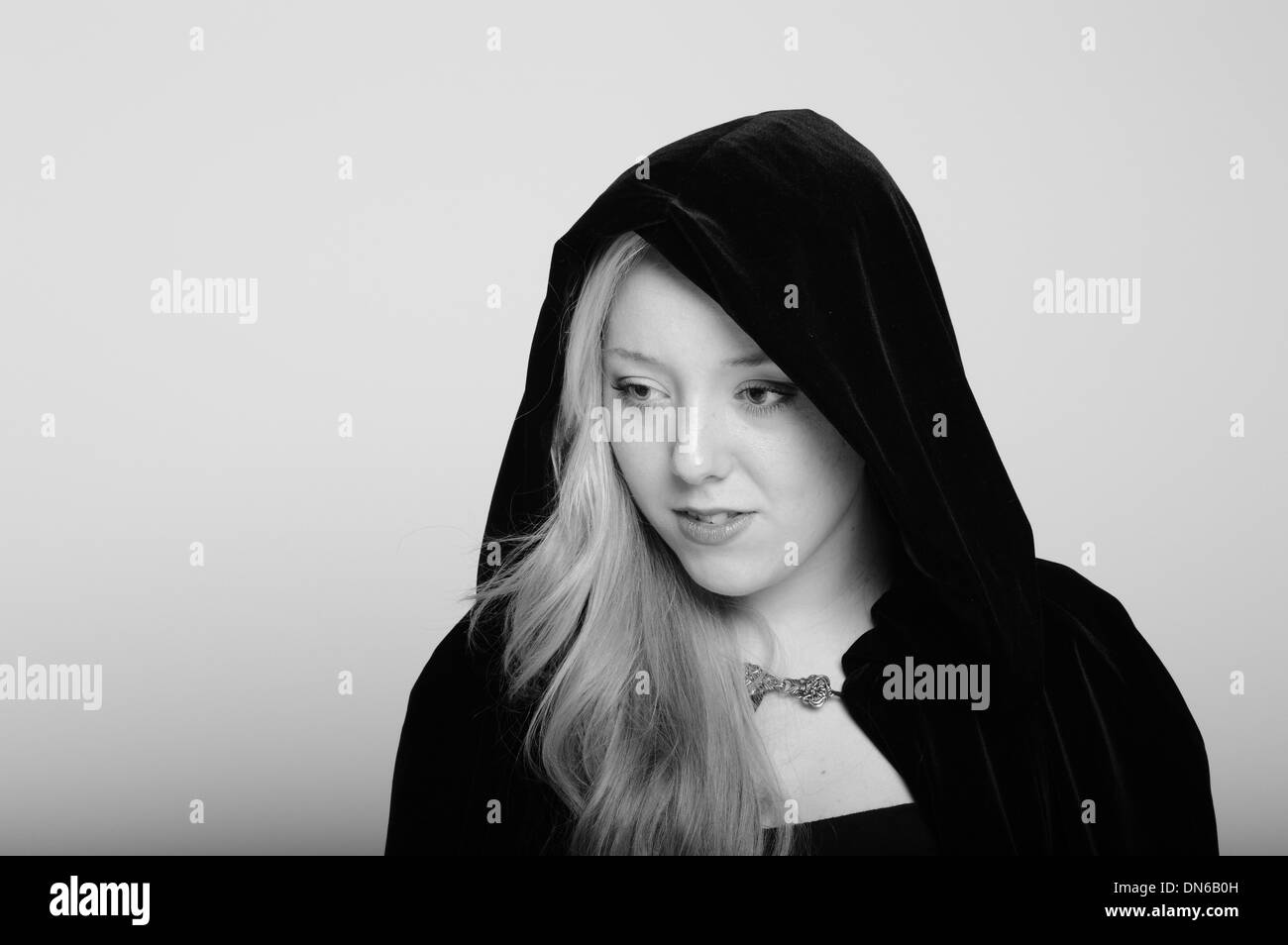 model looking down contemplating life Stock Photo - Alamy