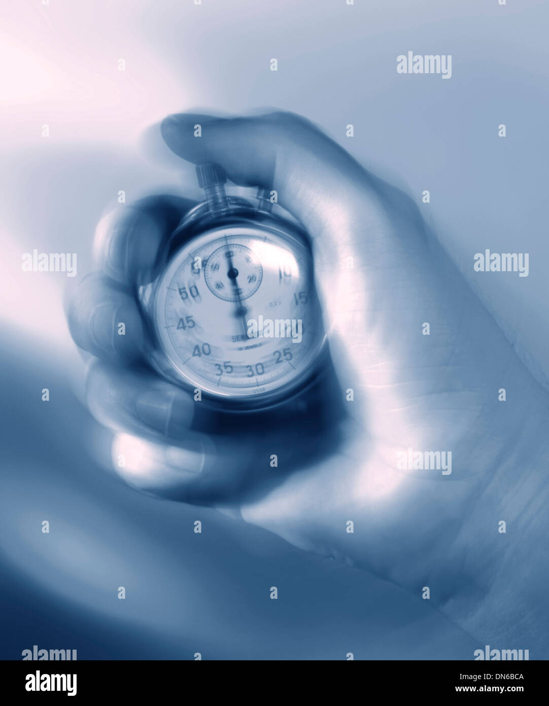 Stopwatch in hand Stock Photo - Alamy