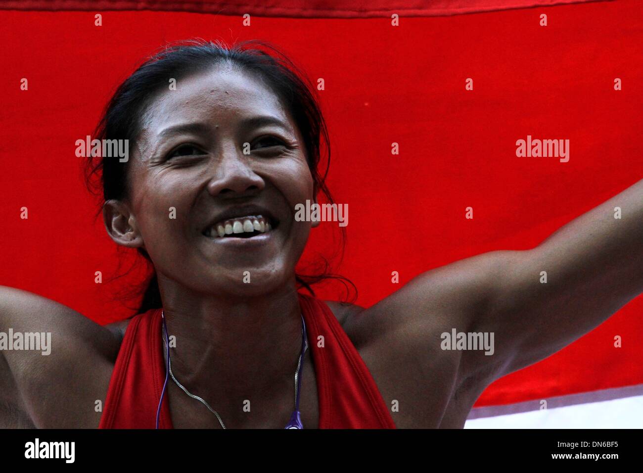 Nay Pyi Taw, Myanmar. 19th Dec, 2013. Gold medalist Dedeh Erawati from ...