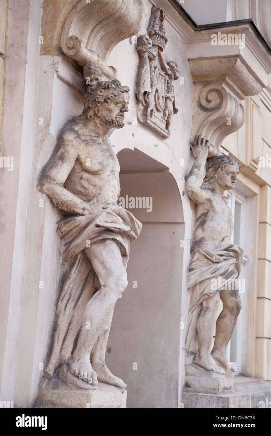 Figures outside All Saints - St Peter and Pauls Church; Krakow; Poland ...