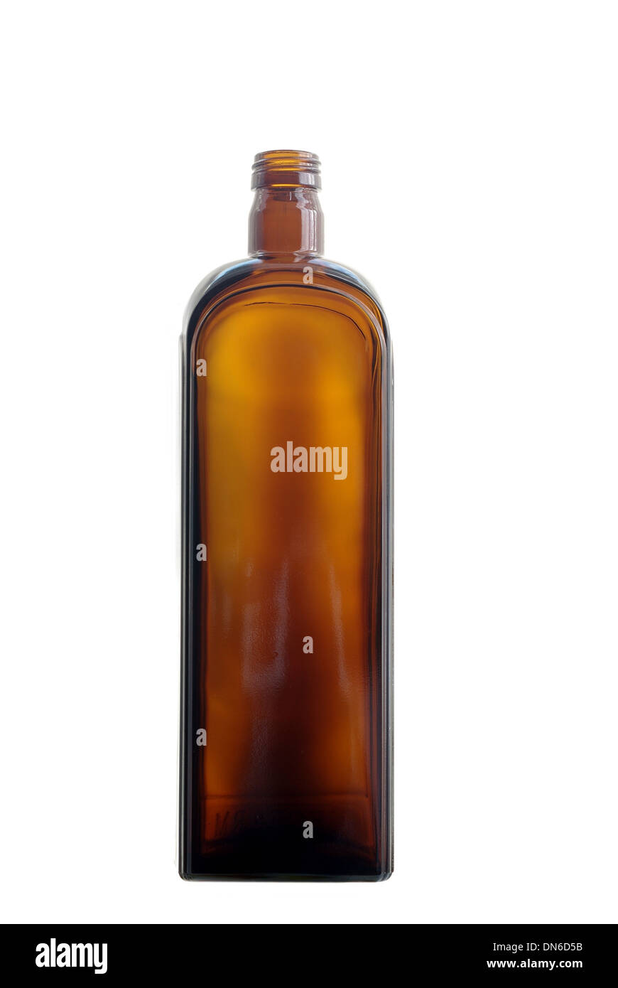 transparent brown glass bottle on white background Stock Photo - Alamy