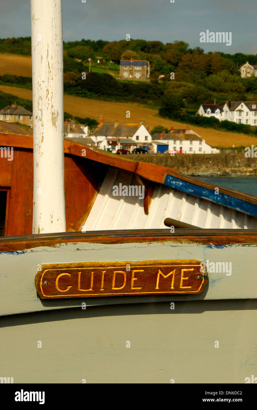 A beached boat (Guide Me) at Coverack harbour Cornwall. UK Stock Photo ...