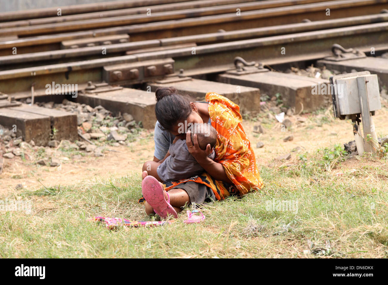 Homeless mother child begging hi-res stock photography and images - Alamy