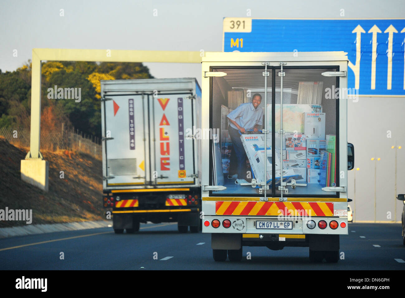 Two lorries driving along a South African motorway Stock Photo - Alamy