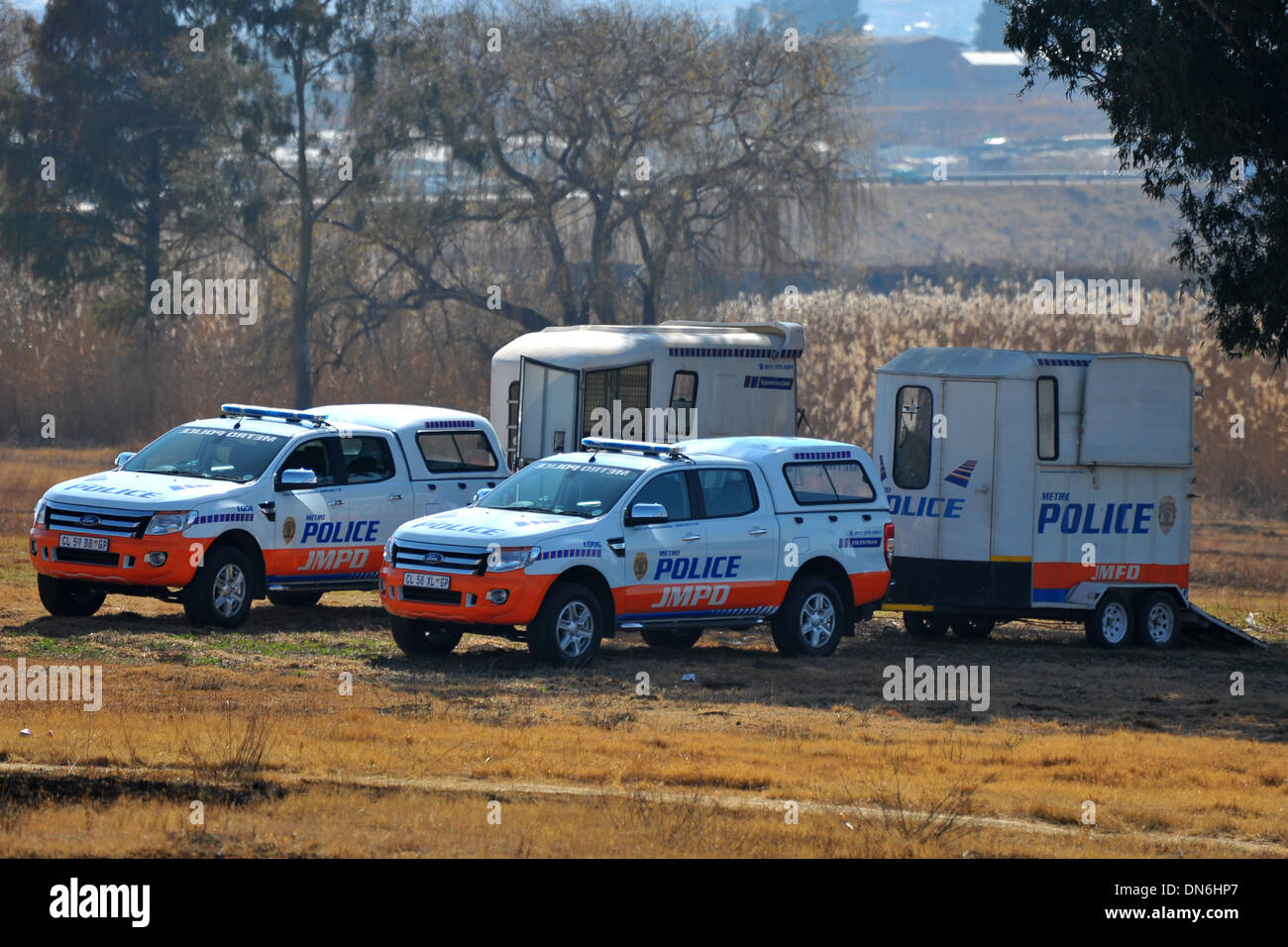 Johannesburg Metropolitan Police Department horse boxes parked under a ...