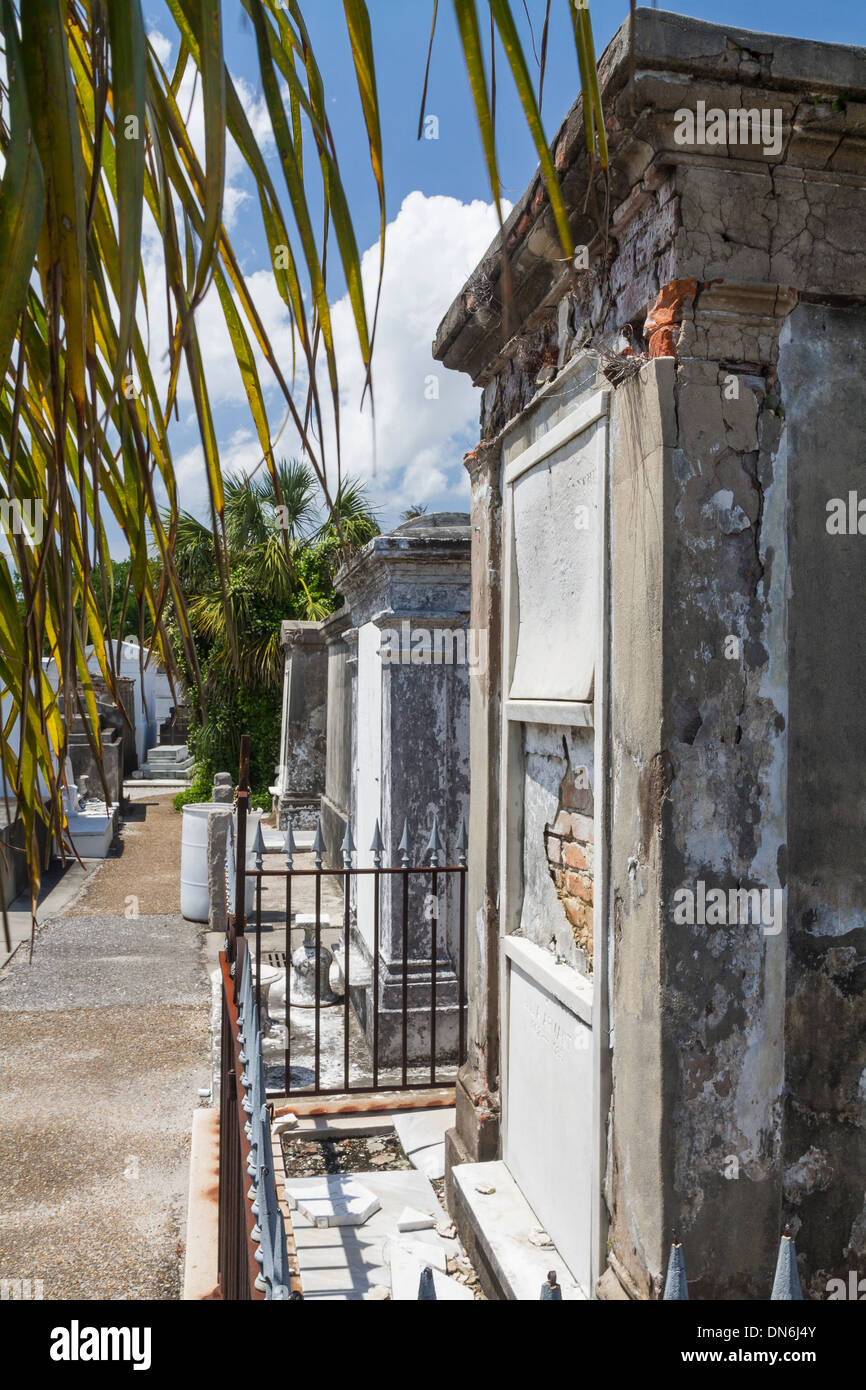 Row of crumbling plaster and brick tombs in St. Louis Cemetery in the ...