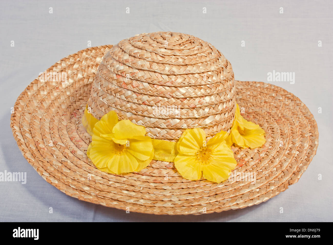 An image showing the concept of Easter with a straw bonnet and some ...