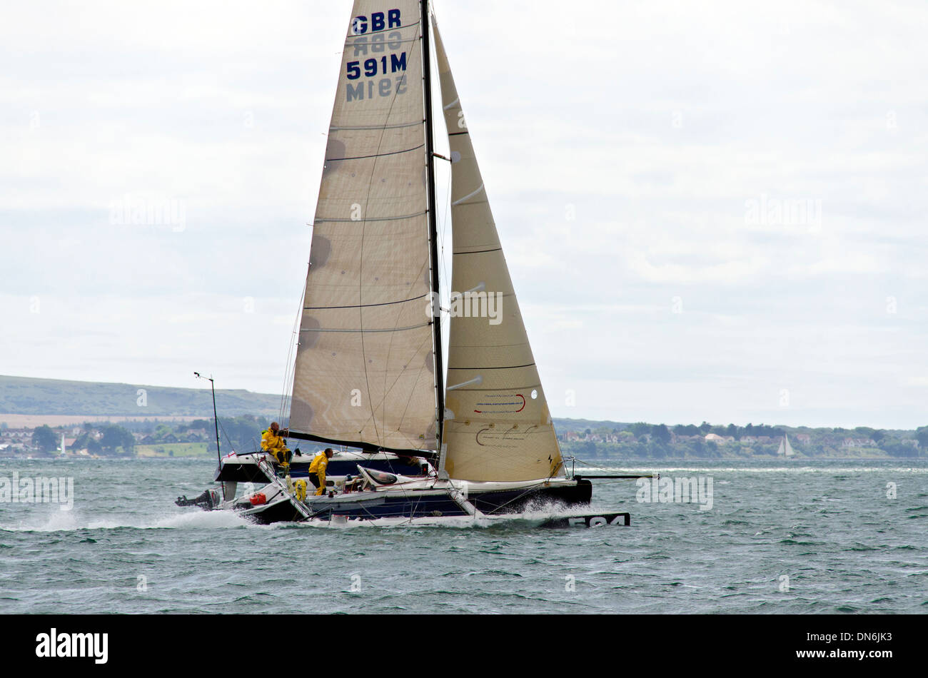 Fastnet yacht race 2013. Racing yacht sailing down the Solent after the ...