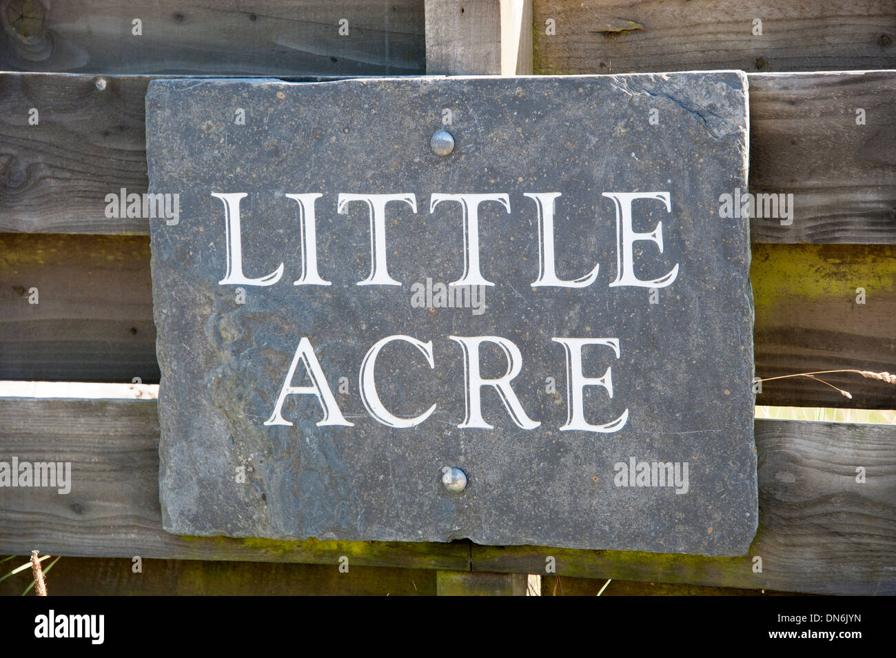 Little Acre Slate Sign White Lettering Letters Stock Photo - Alamy