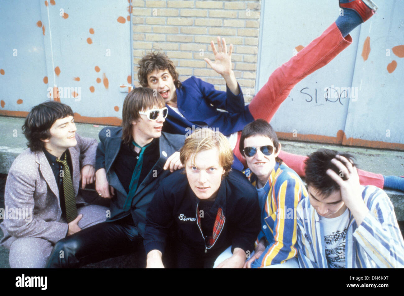 BOOMTOWN RATS UK rock group about 1984 with Bob Geldof in red trousers ...