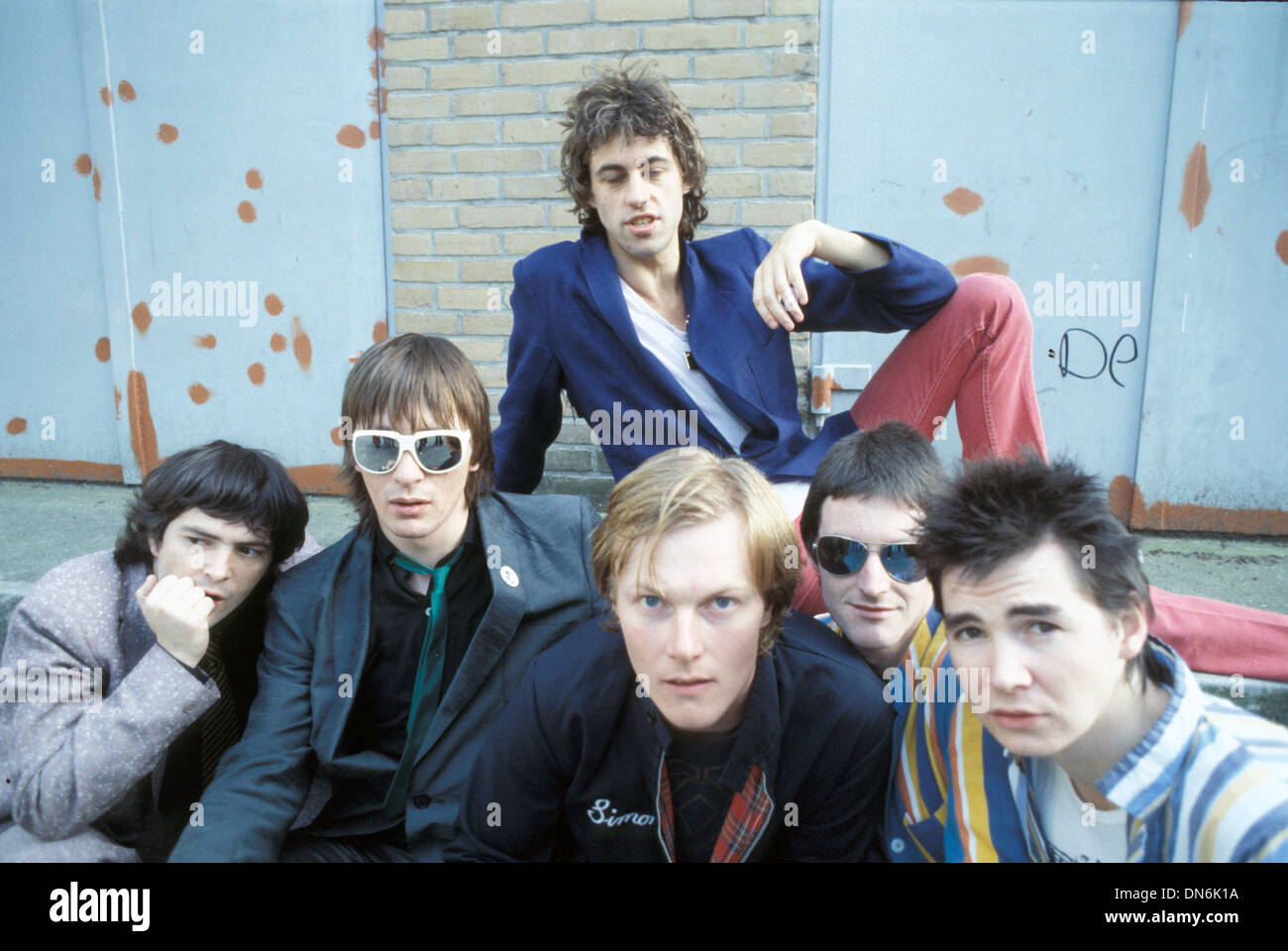 BOOMTOWN RATS UK rock group about 1984 with Bob Geldof in red trousers ...