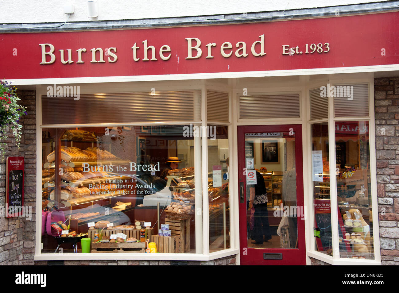 Burns The Bread Burnt Word Pun Funny Sign Bakery Stock Photo - Alamy