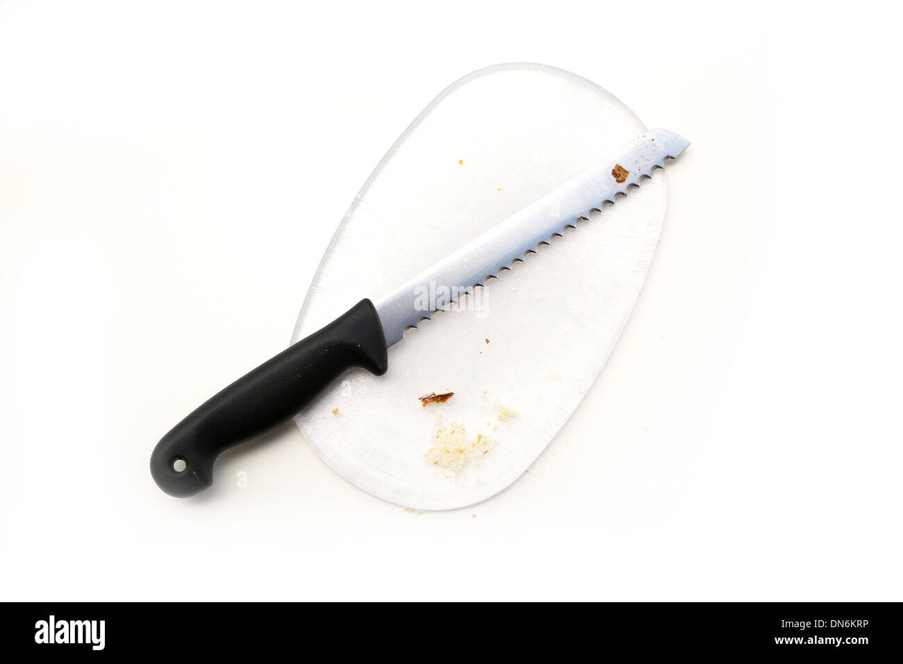 A dirty Knife and a Trencher after cutting cake Stock Photo - Alamy