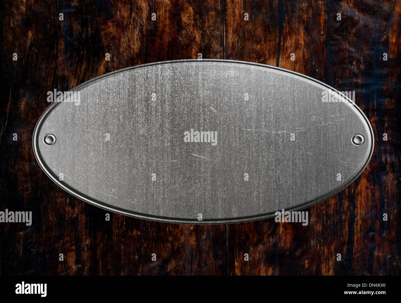 metal sign on wood plank background Stock Photo - Alamy