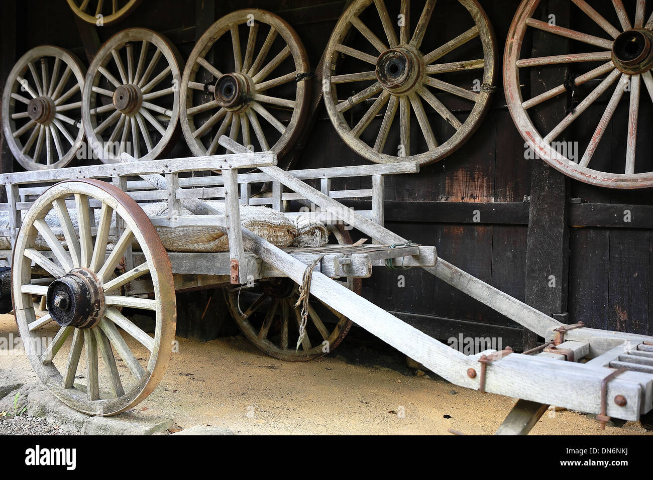 Primitive wooden wheel cart hi-res stock photography and images - Alamy
