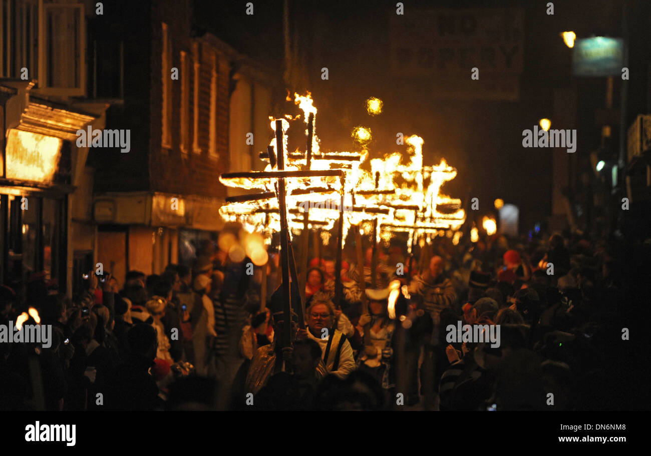 Flaming crosses pass through the streets of Lewes, East Sussex on ...