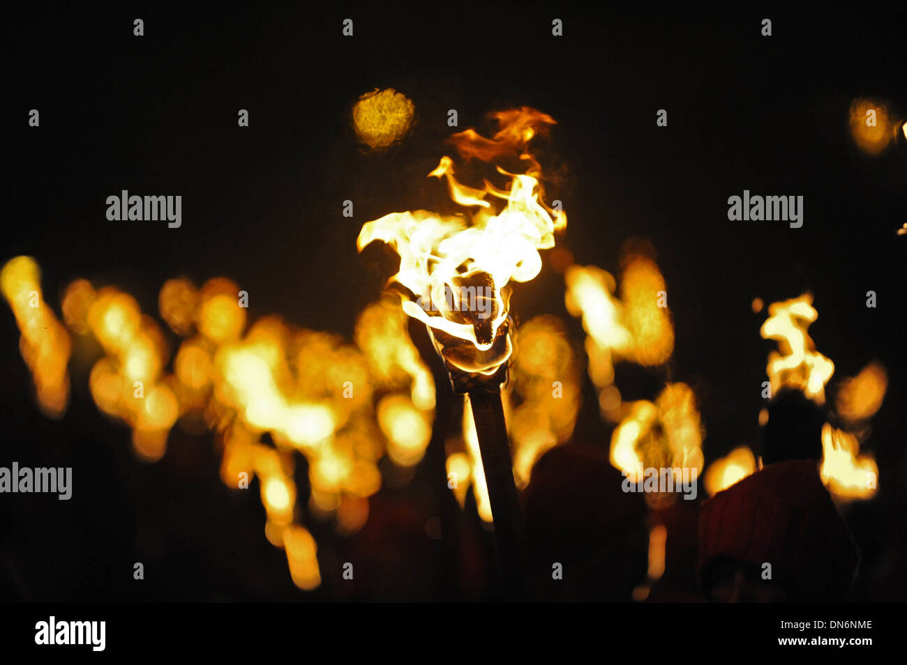 Flaming torches pass through the streets of Lewes, East Sussex on ...