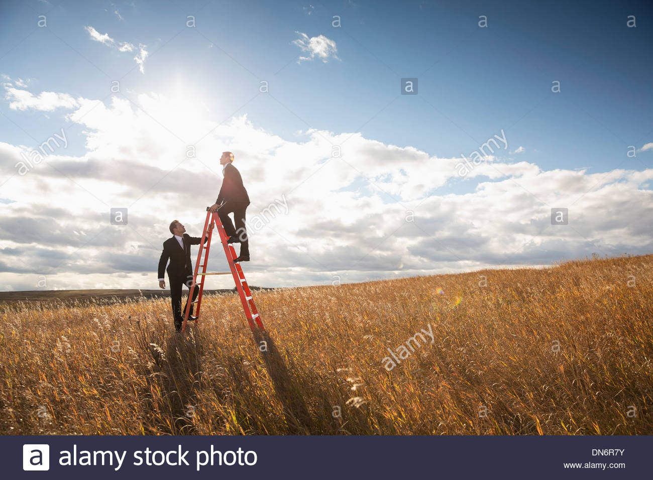 People climbing ladder hi-res stock photography and images - Alamy