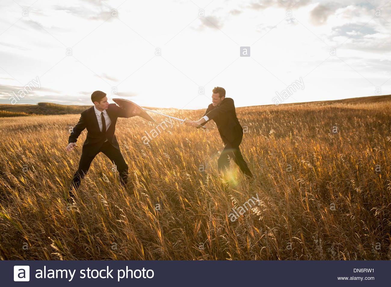Three business people fighting hi-res stock photography and images - Alamy