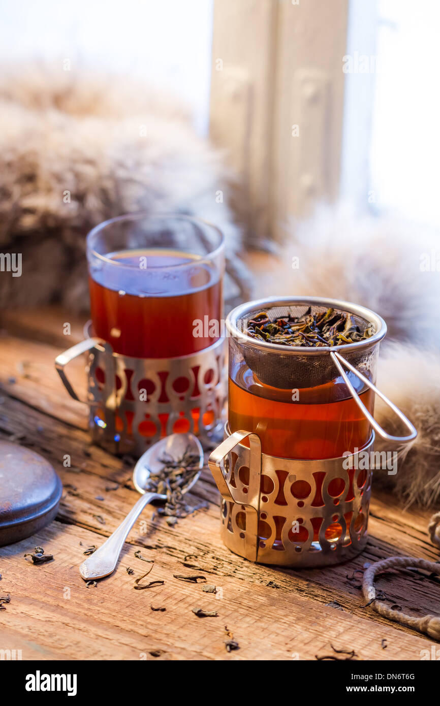 Warming tea served in old-fashioned Stock Photo - Alamy