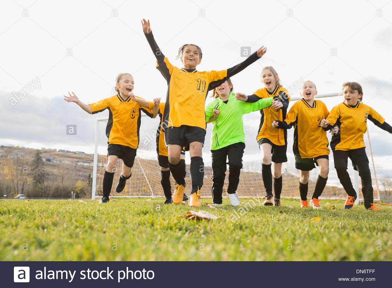 Successful soccer players running on hi-res stock photography and ...