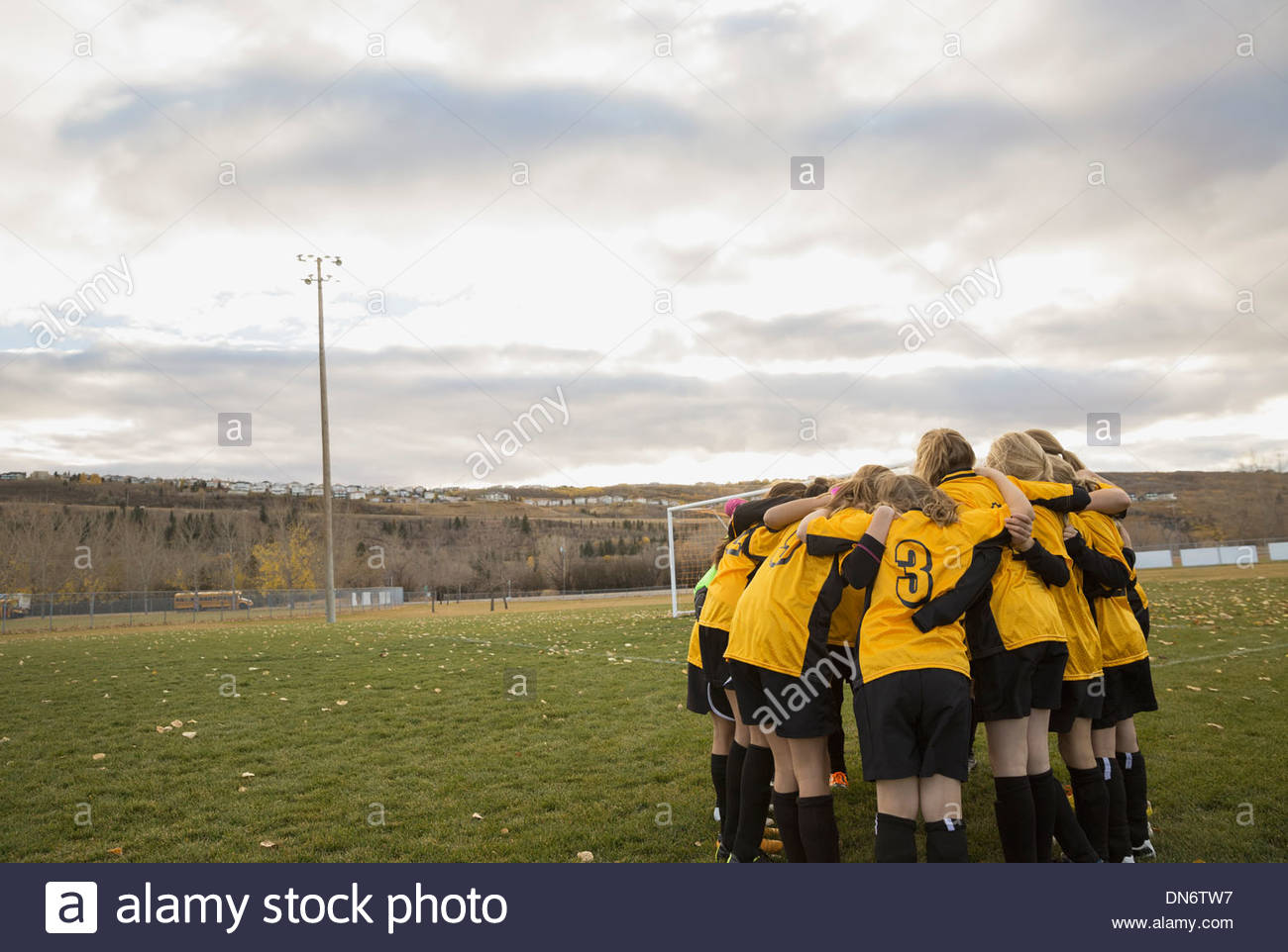 Girls Soccer Team Huddle