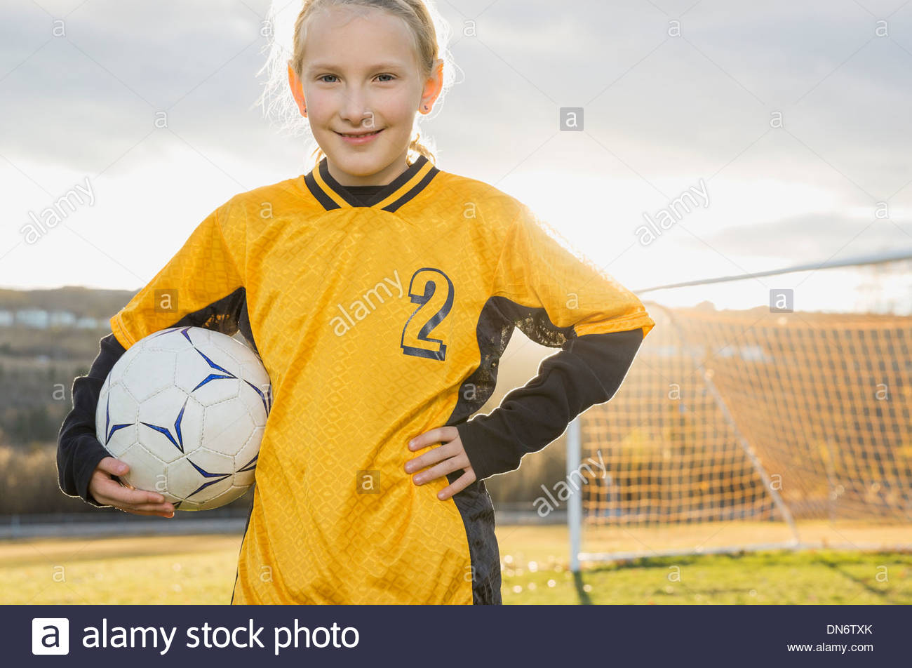 Confident soccer player ball standing hi-res stock photography and ...