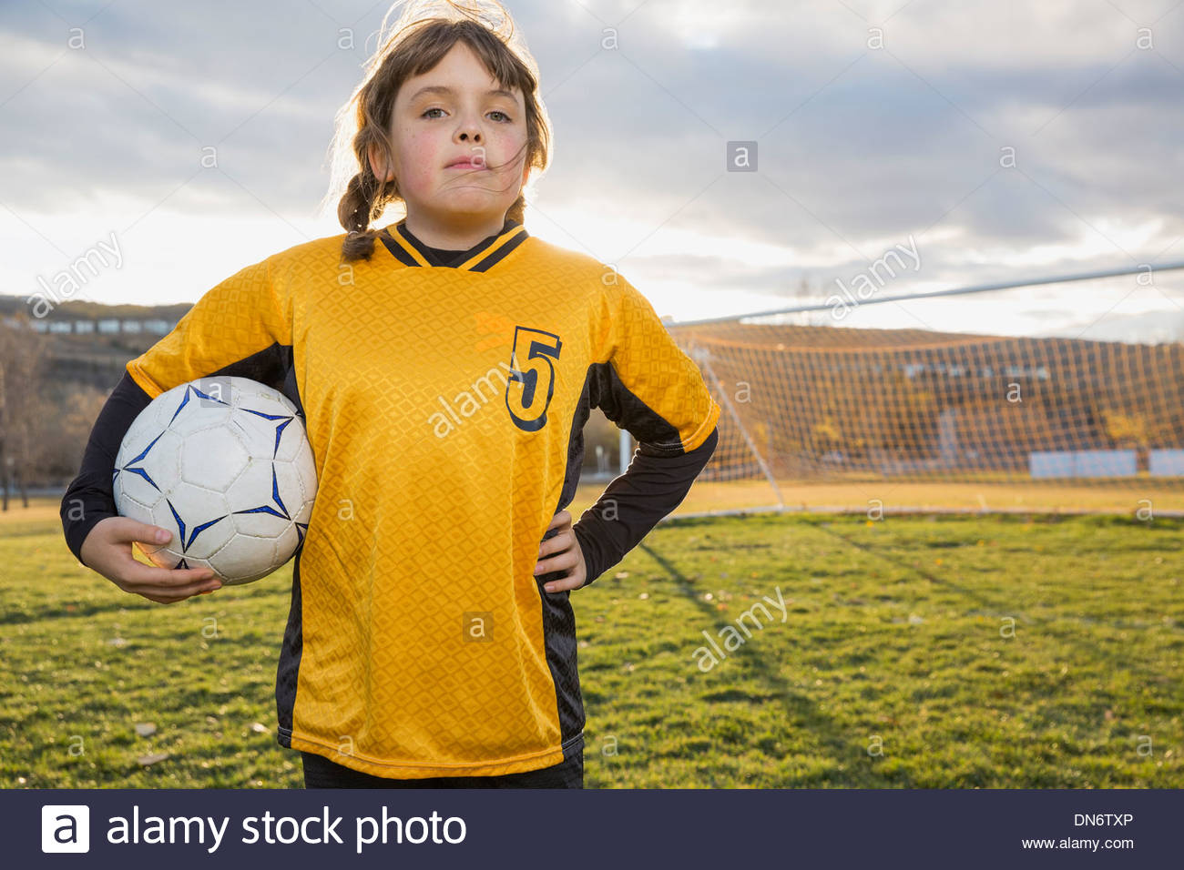 Confident soccer player ball standing hi-res stock photography and ...