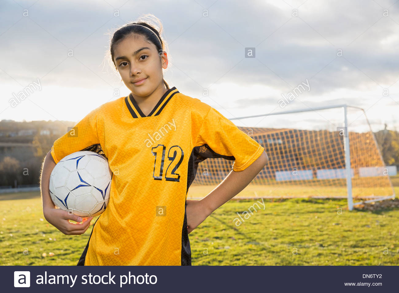 Confident soccer player ball standing hi-res stock photography and ...