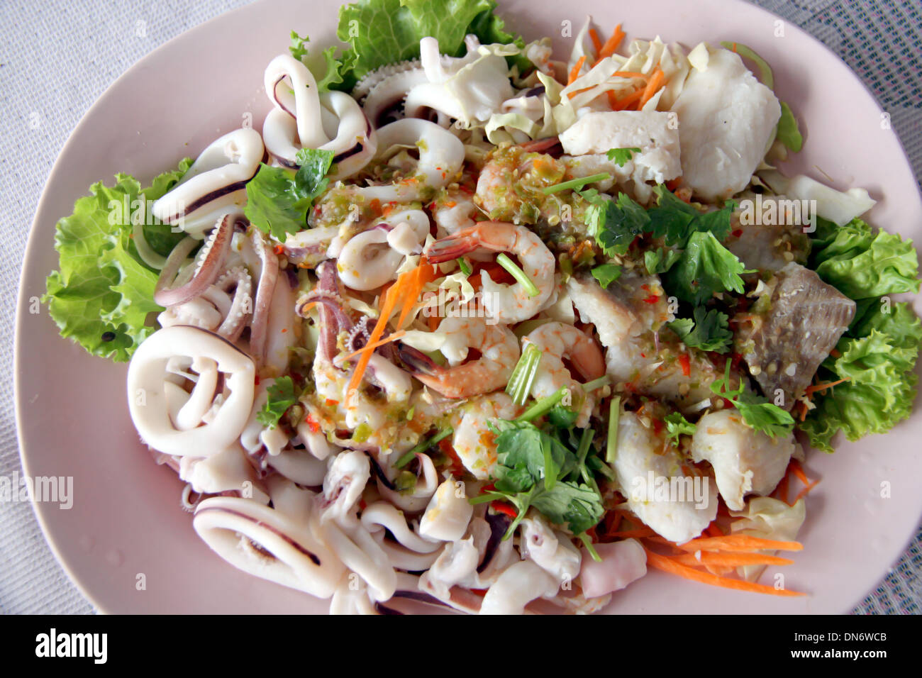 Mixed seafood salad in dish,The Thai food made form shrimp,fish ...
