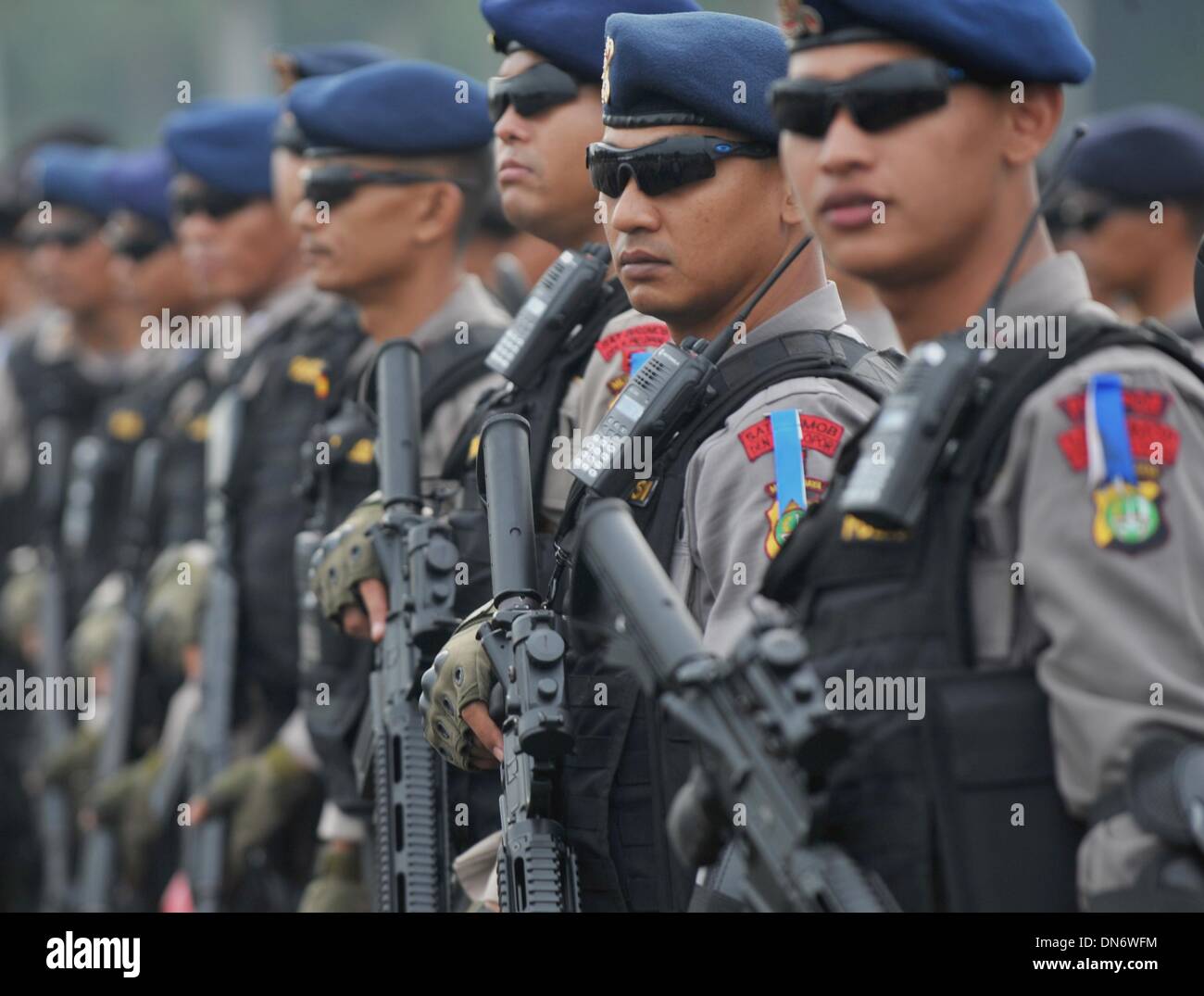 Jakarta, Indonesia. 20th Dec, 2013. Indonesian police officers ...