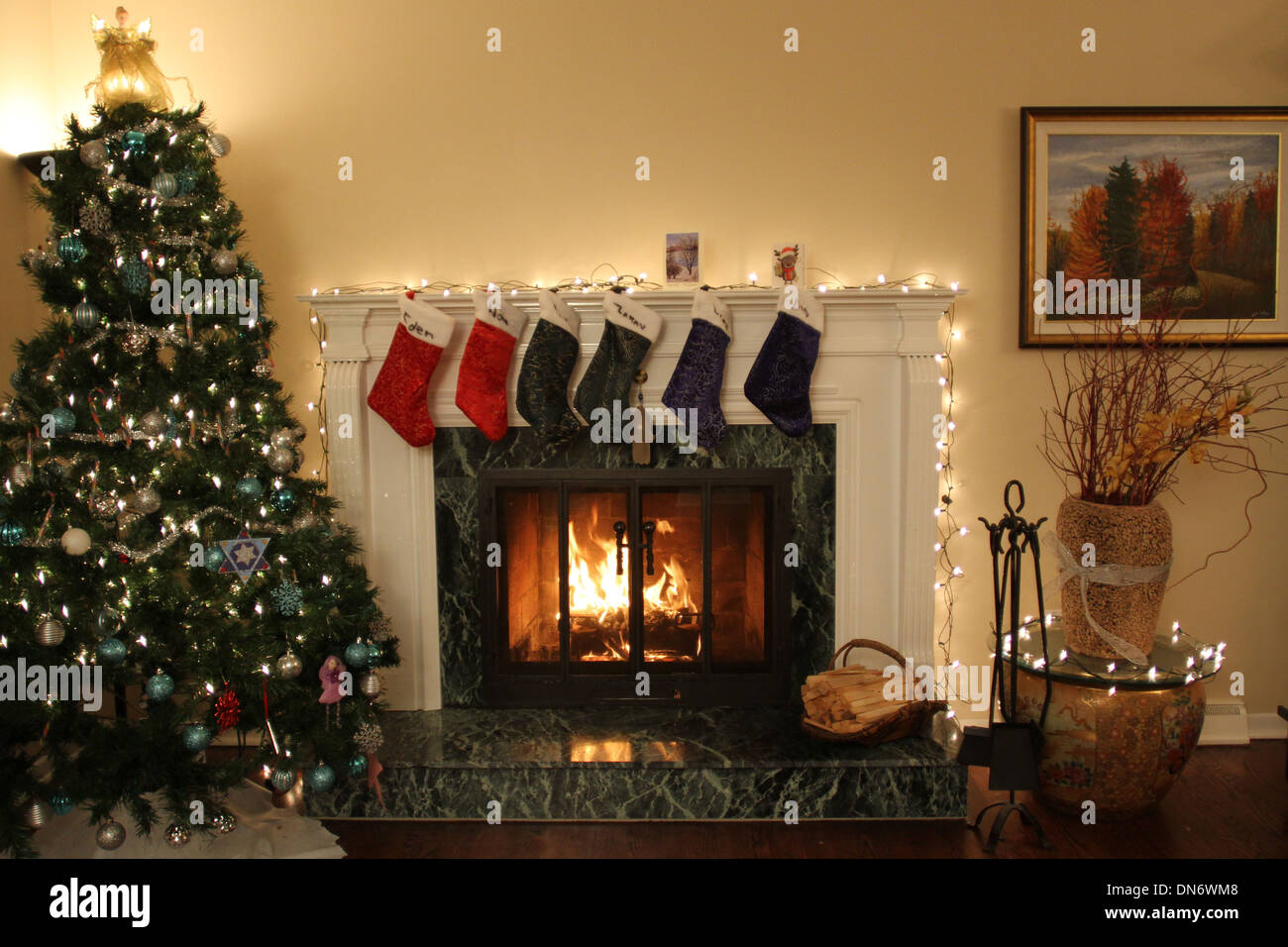 Stockings hung over the fireplace during Christmas Stock Photo - Alamy