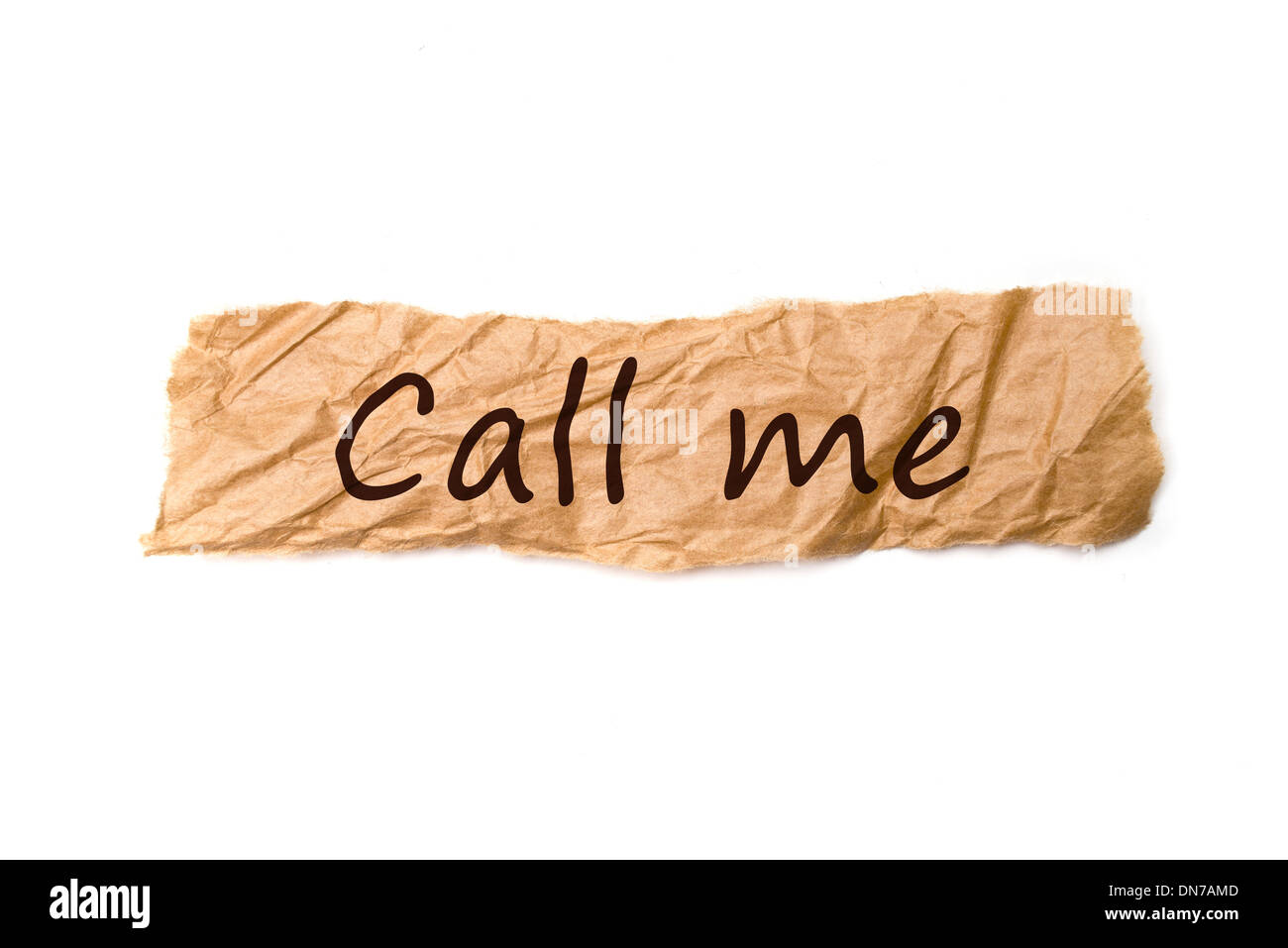 Call me note on crumpled paper over white background Stock Photo - Alamy