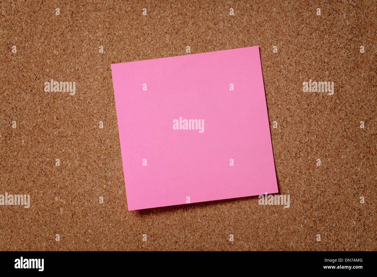 pink reminder sticky note on cork board, empty space for text Stock ...