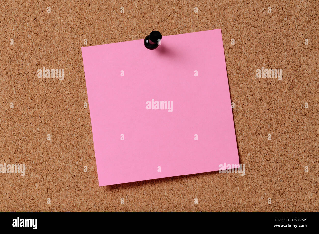 pink reminder sticky note on cork board, empty space for text Stock ...