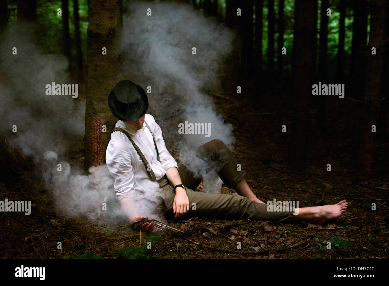 Smoking hand gun hi-res stock photography and images - Alamy