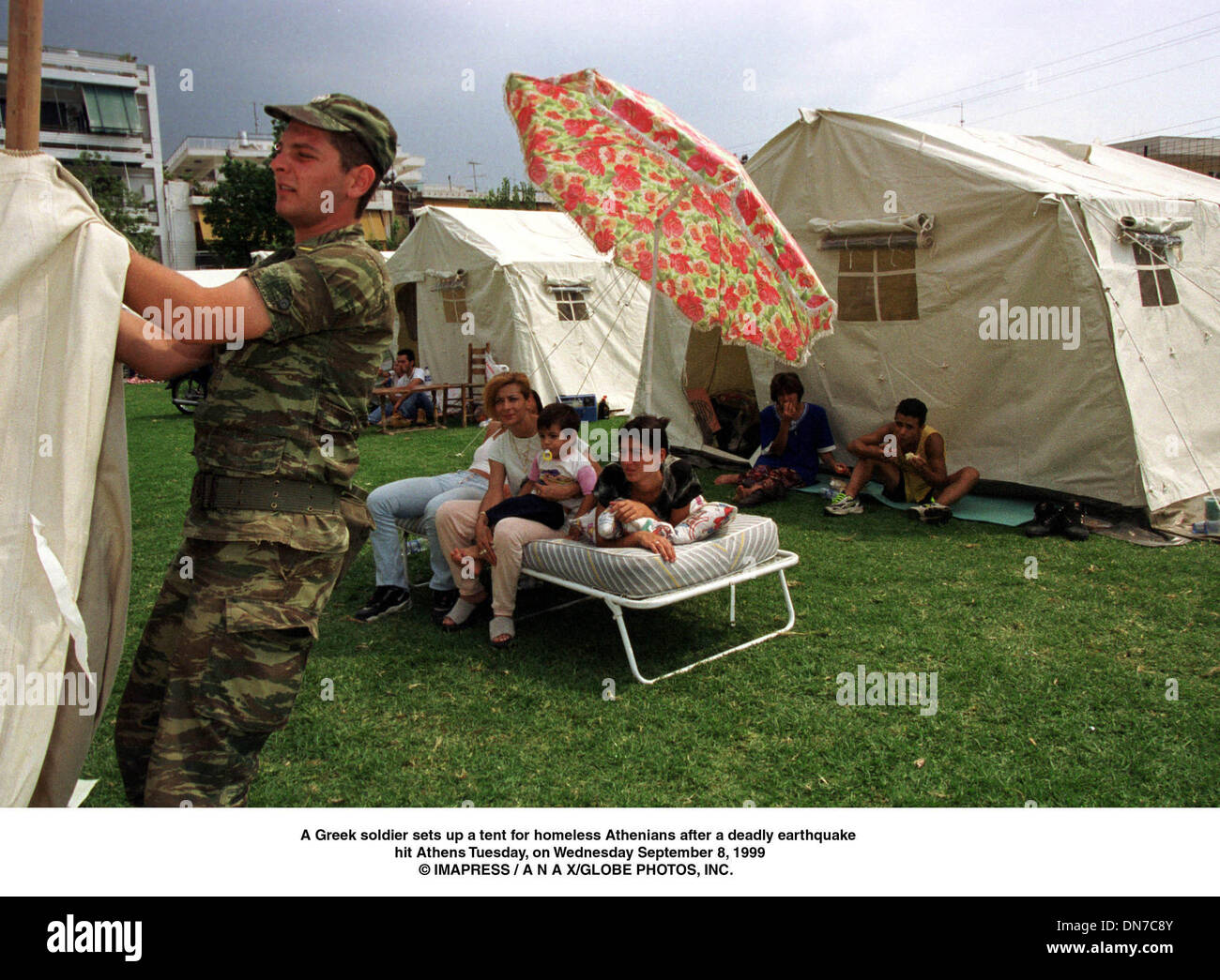 Sept. 8, 1999 - Athens, GRC - A Greek soldier sets up a tent for ...