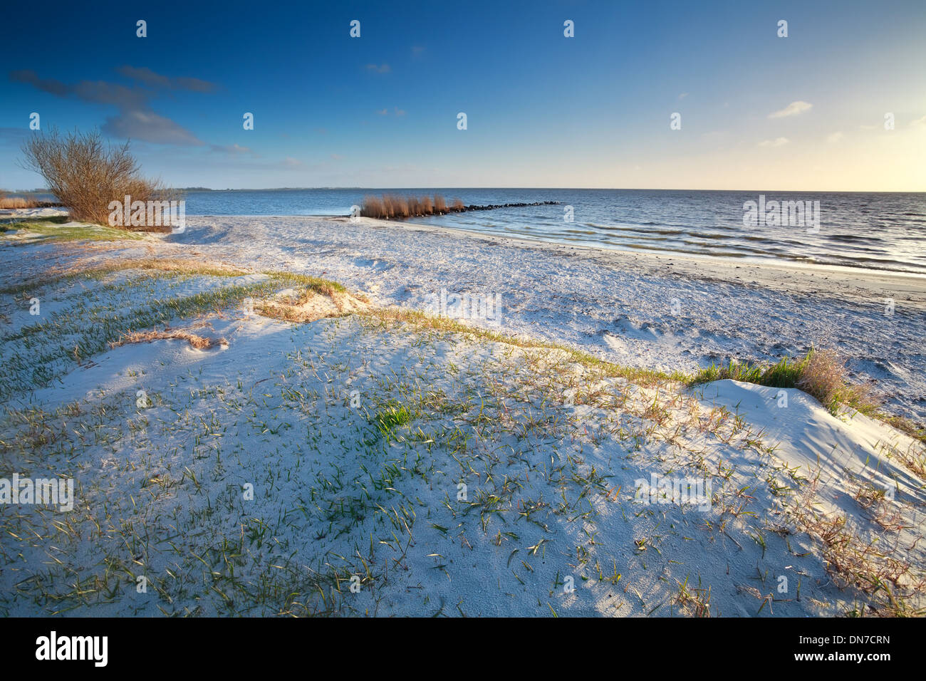 sunshine over sand beach by North sea Stock Photo - Alamy