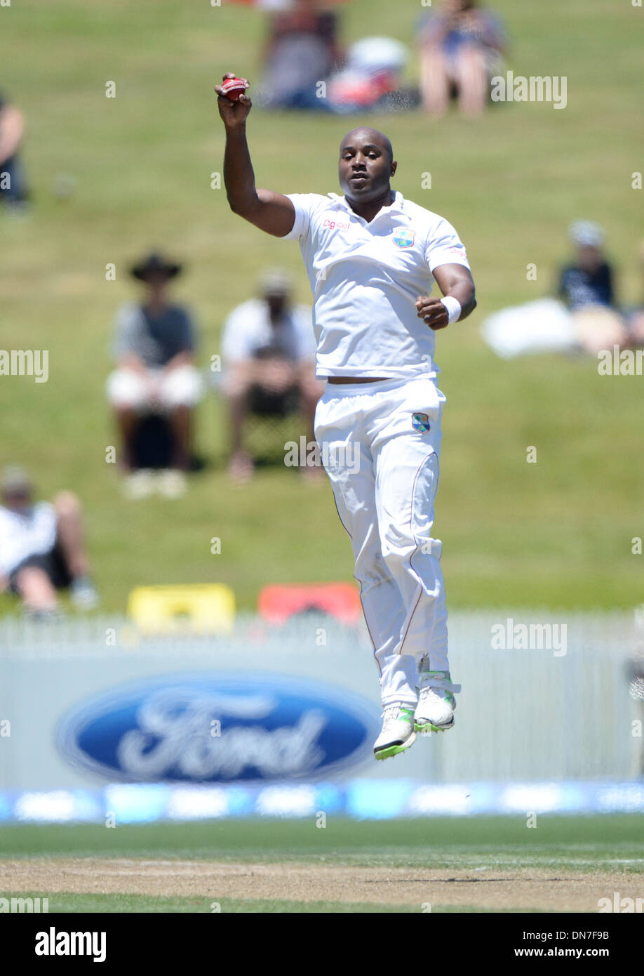 Hamilton, New Zealand. 20th Dec, 2013. Tino Best fielding off his own ...