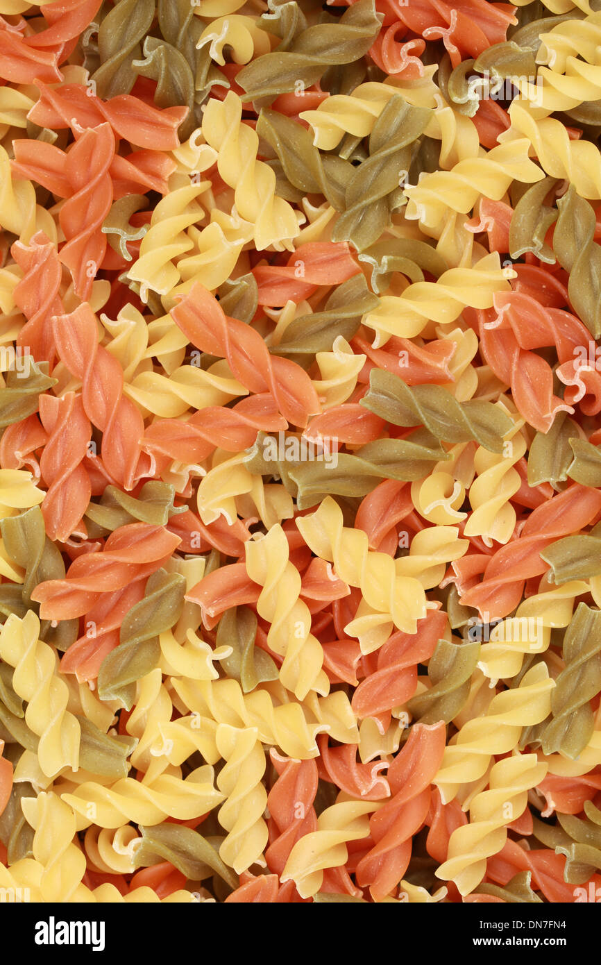 Colorful italian pasta forming a background with copy space Stock Photo ...