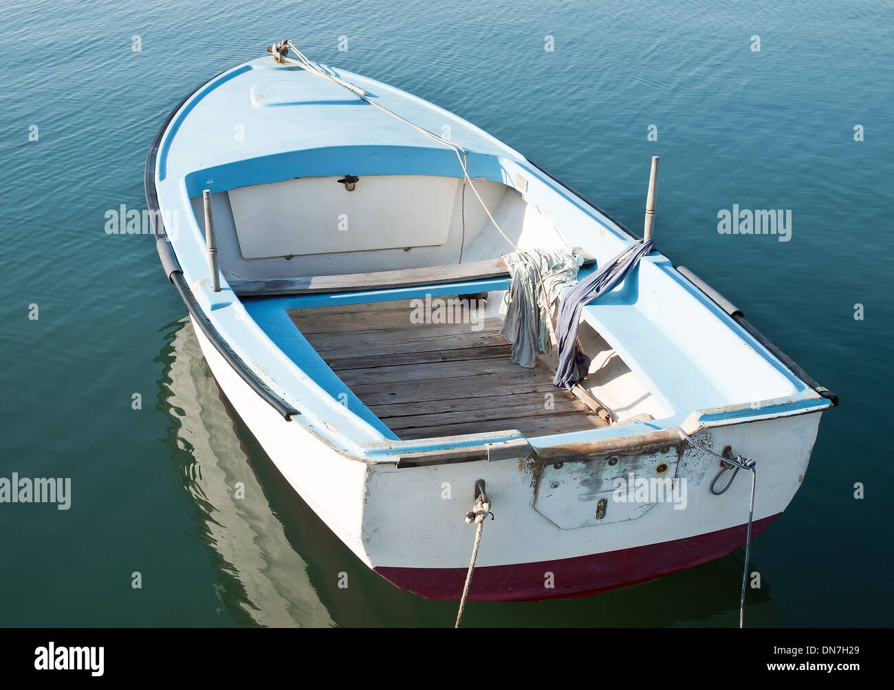 old little boat on the calm sea Stock Photo - Alamy