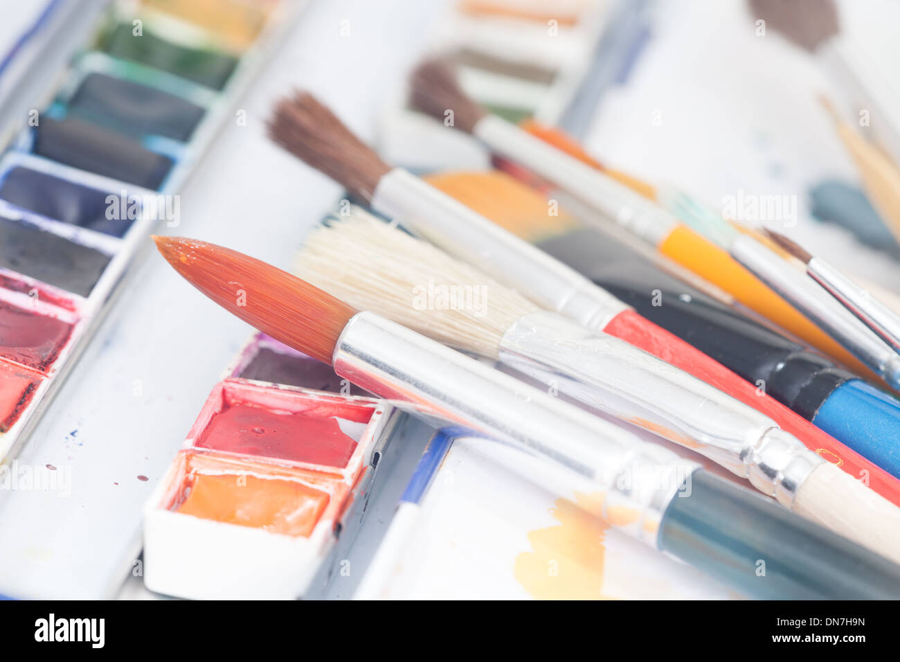 Professional watercolor paints with artistic brushes Stock Photo - Alamy