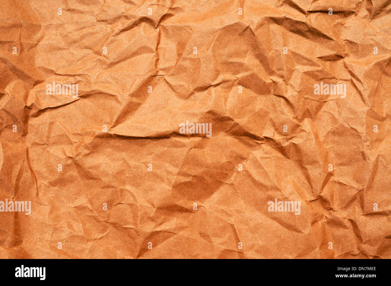 background made of a closeup of a crumpled brown paper Stock Photo - Alamy