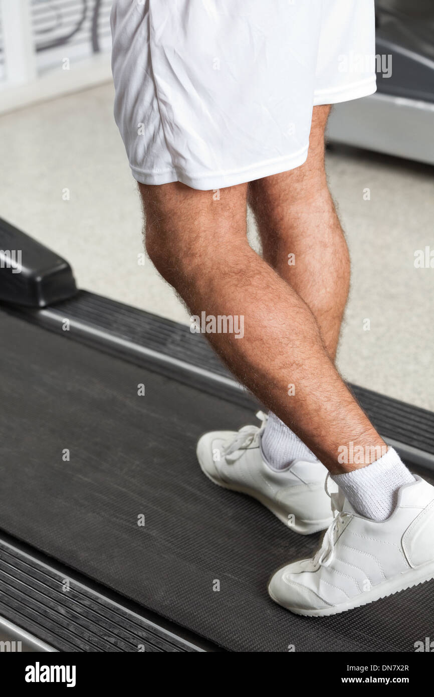 Man Walking On Treadmill In Health Club Stock Photo - Alamy