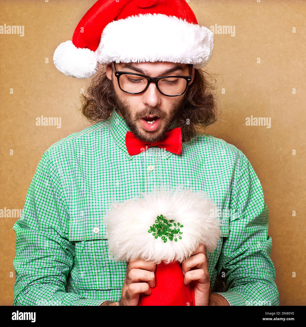 Santa Claus with the socks of the presents Stock Photo - Alamy