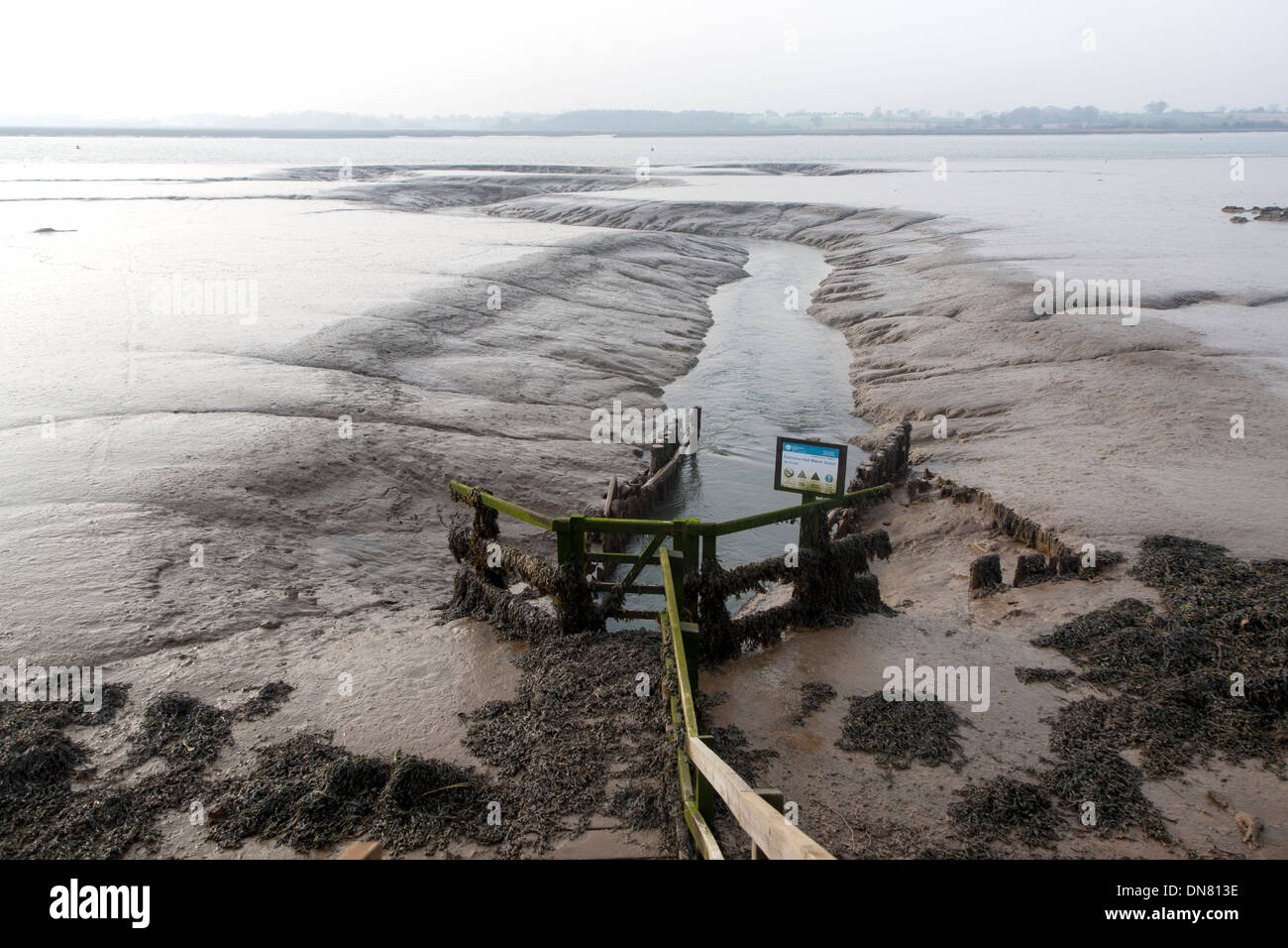 Drainage sluice channel on the River Deben at low tide, Sutton, Suffolk ...