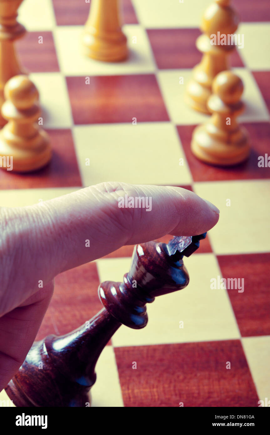 Hand pushing king hi-res stock photography and images - Alamy