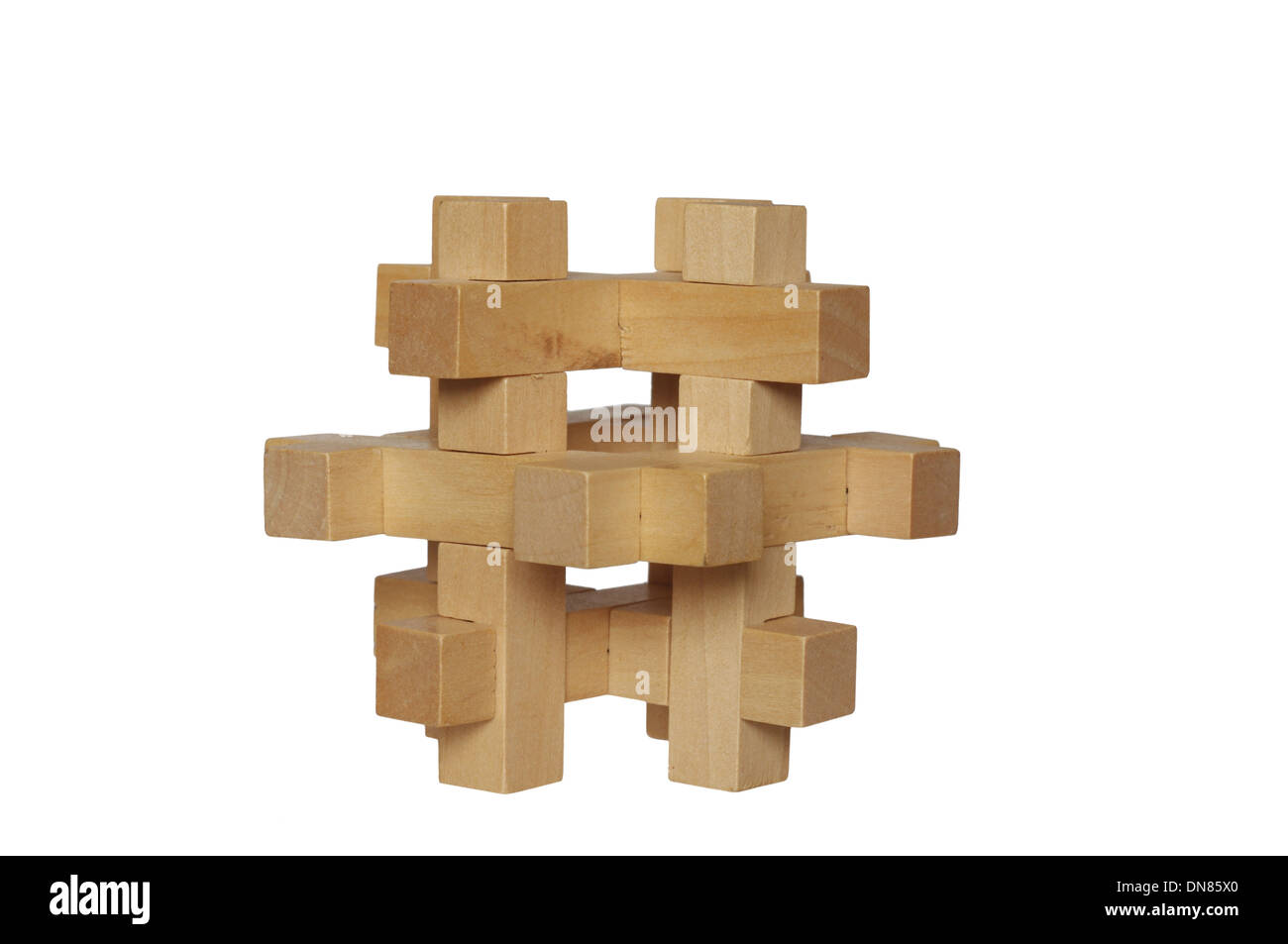wooden riddle on a white background Stock Photo - Alamy