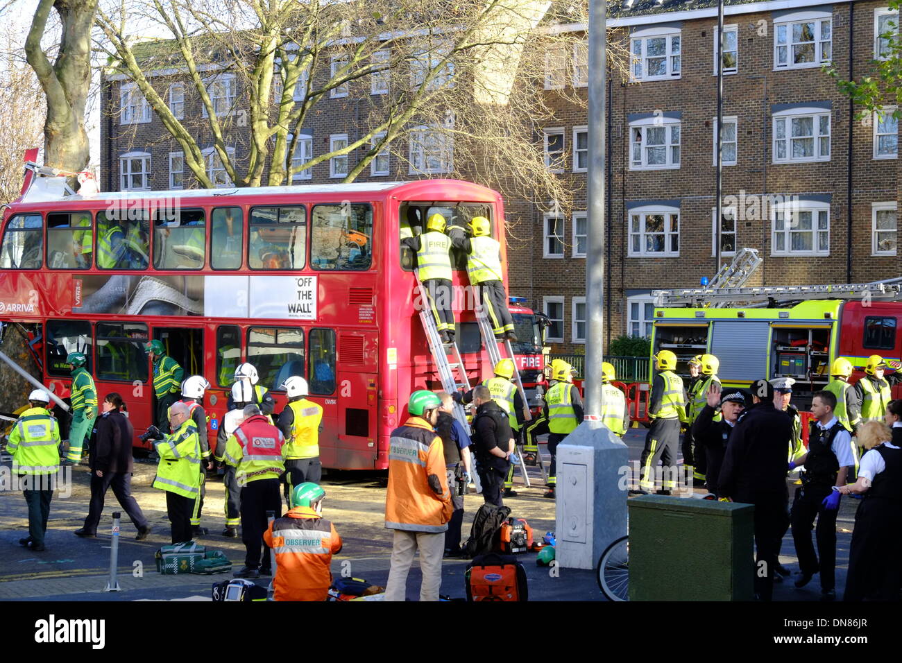 London, UK. 20th December 2013. NO.59 bus crashes into tree, many ...