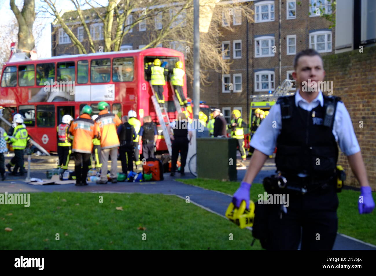 London, UK. 20th December 2013. NO.59 bus crashes into tree, many ...